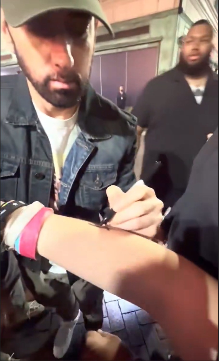 Eminem Surprises Fans in Detroit with Impromptu Signing